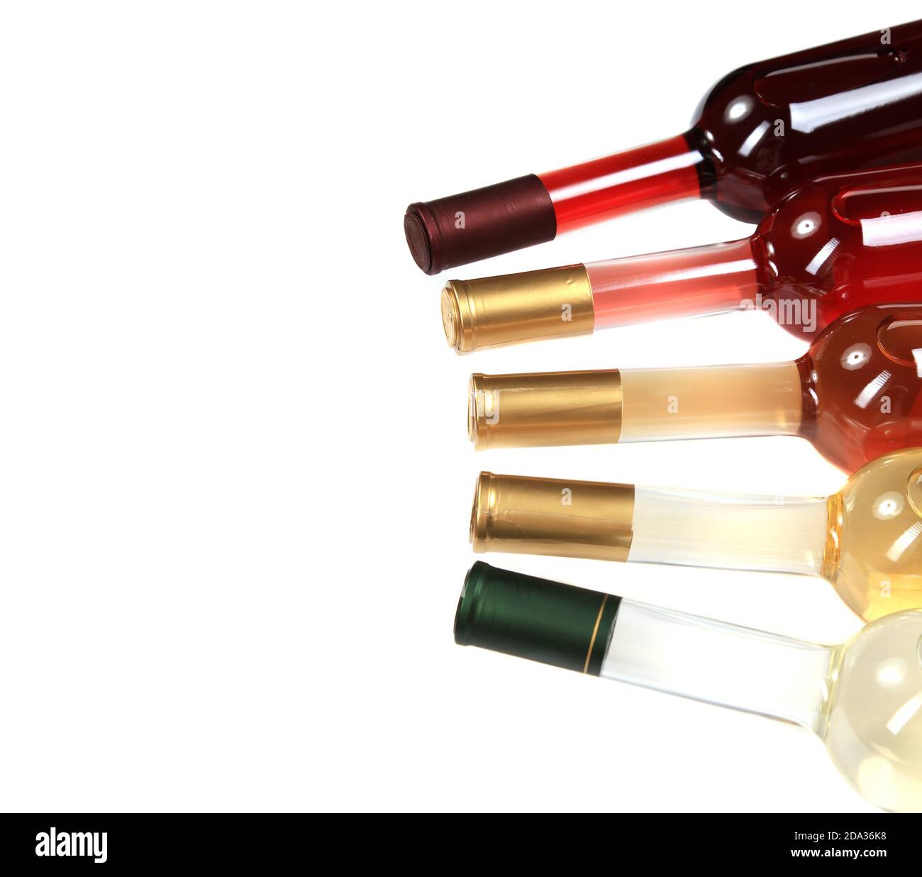 Top view shot of different beverage on glass bottles isolated on white ...