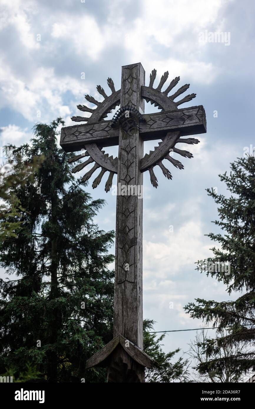 Ancient wooden cross with wood carvings Stock Photo - Alamy