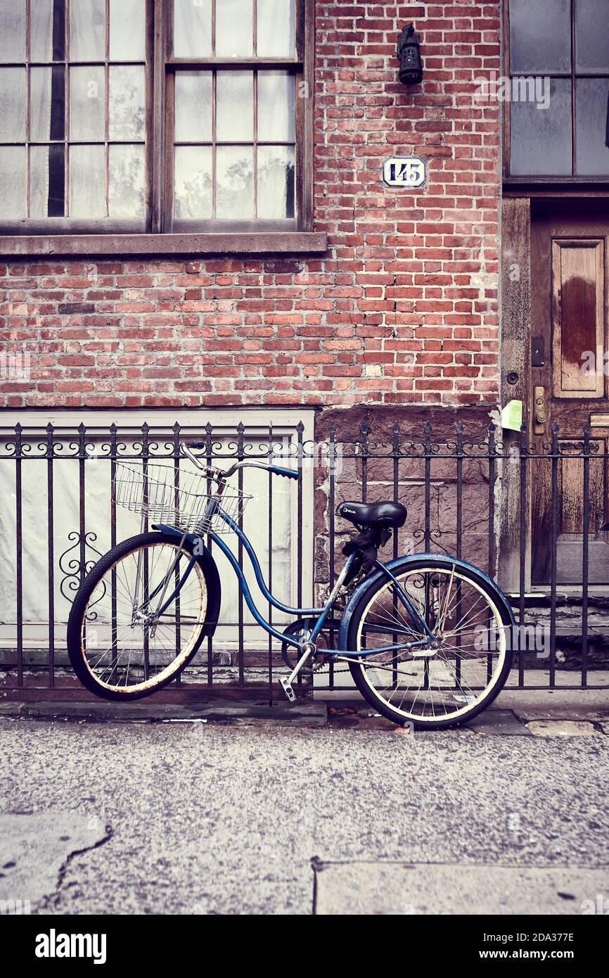 Bicycle chained railing hi-res stock photography and images - Alamy