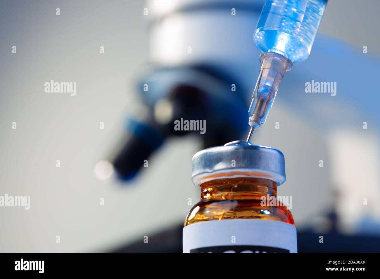 Medical vial with medication and syringe close up Stock Photo - Alamy