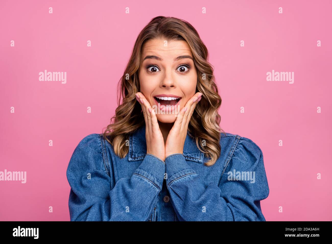 Portrait Of Astonished Girl Touch Hands Face Scream Isolated Over