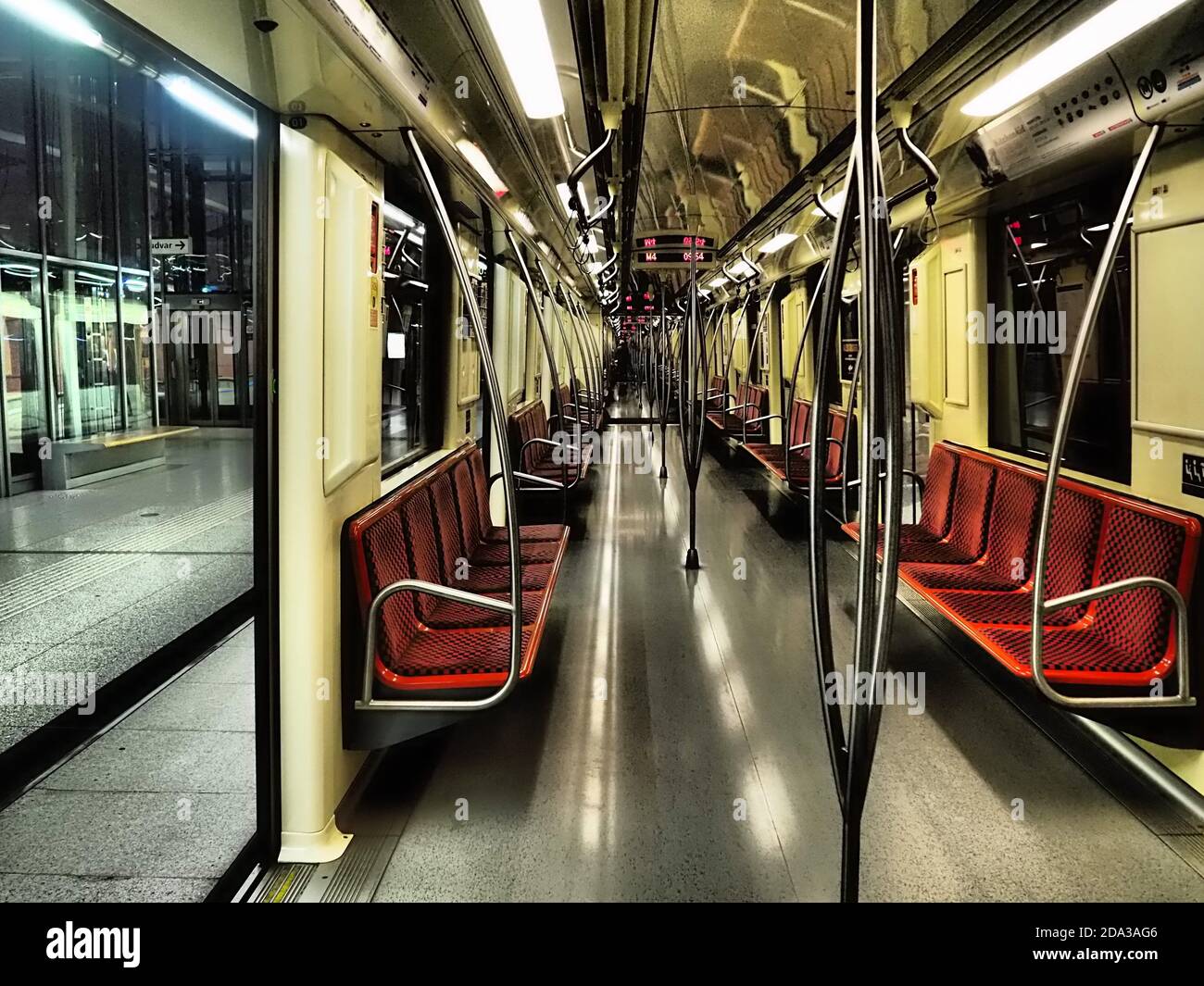 View inside an empty train in a train station Stock Photo - Alamy
