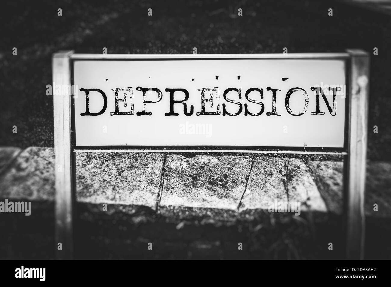 Depression on a road sign Stock Photo - Alamy