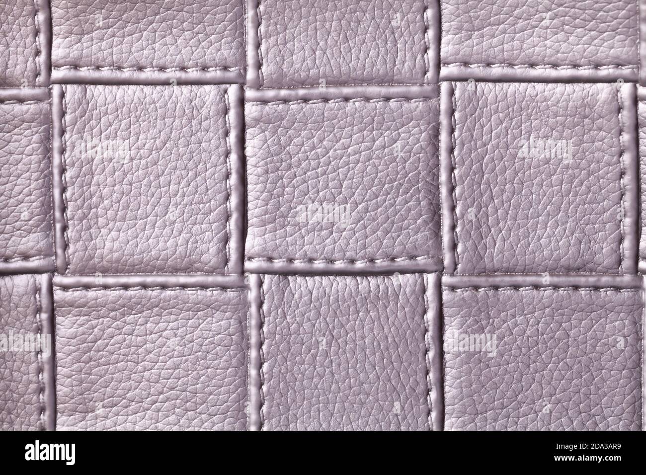 Texture of purple leather background with square pattern and stitch ...
