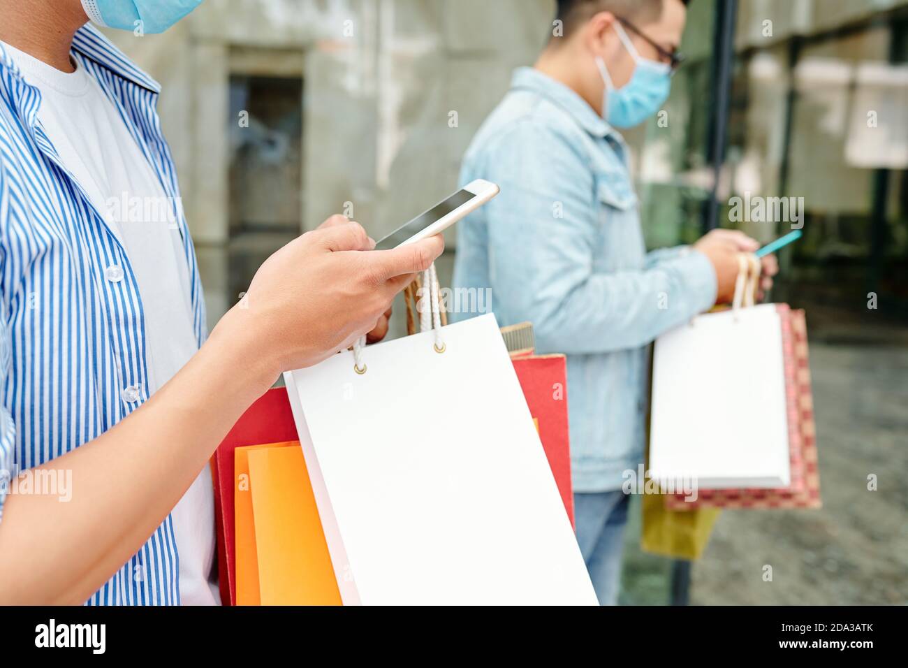 Checking phones hi-res stock photography and images - Alamy