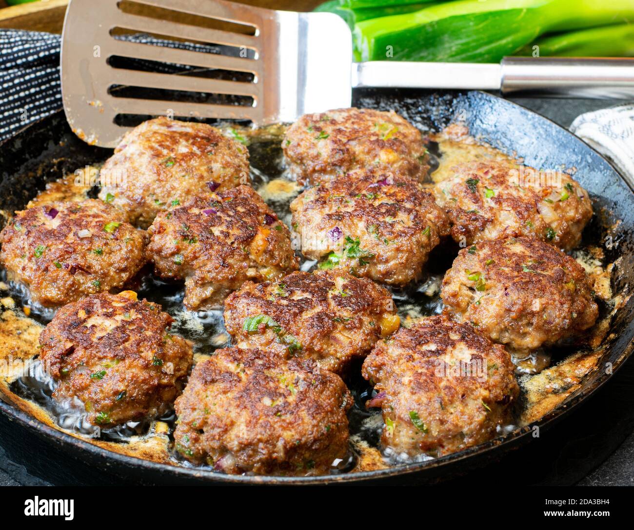 meatballs in a frying pan Stock Photo - Alamy