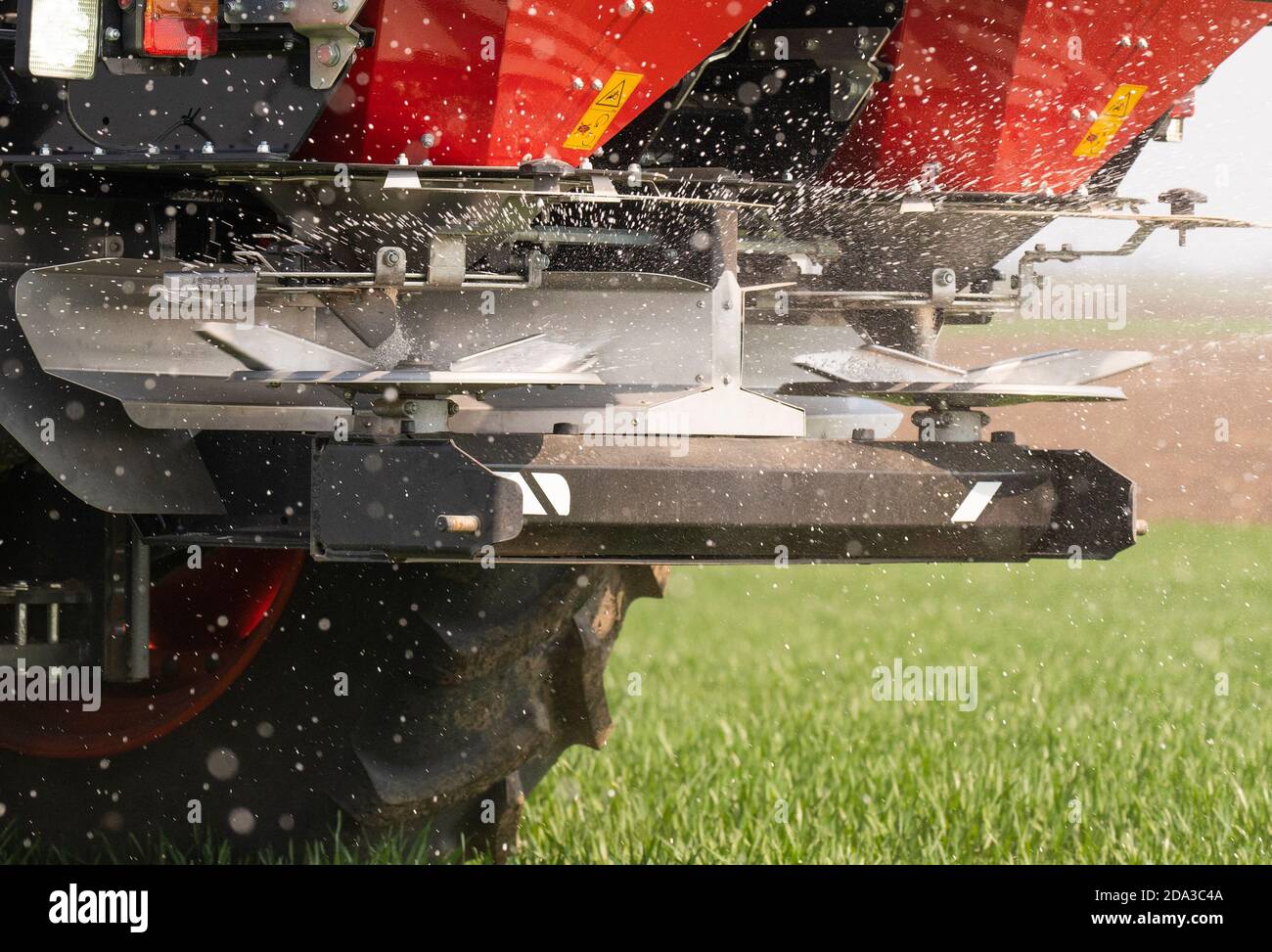 Tractor spreading artificial fertilizers. Transport, agricultural Stock ...