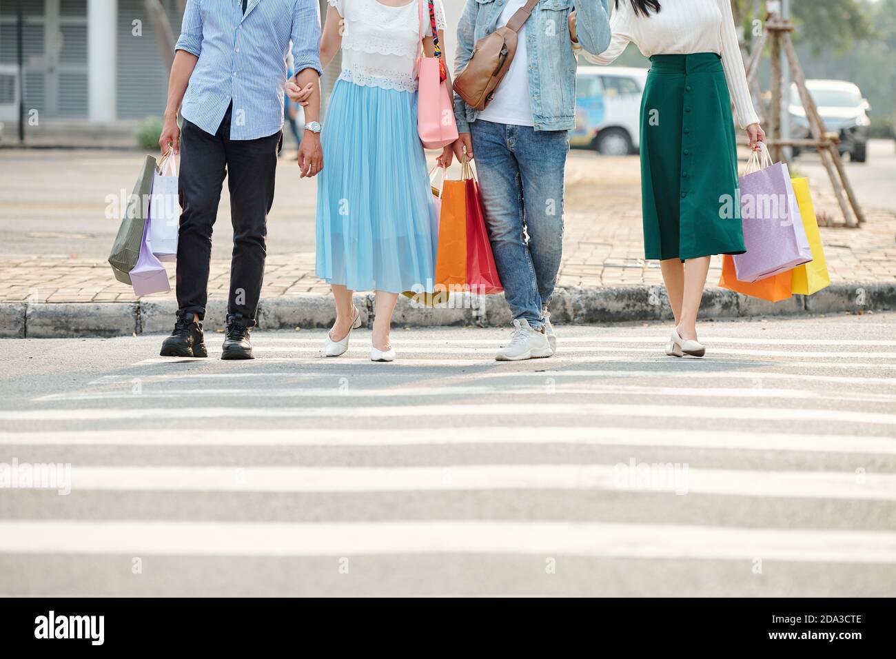 People on pedestrian crosswalk Stock Photo - Alamy