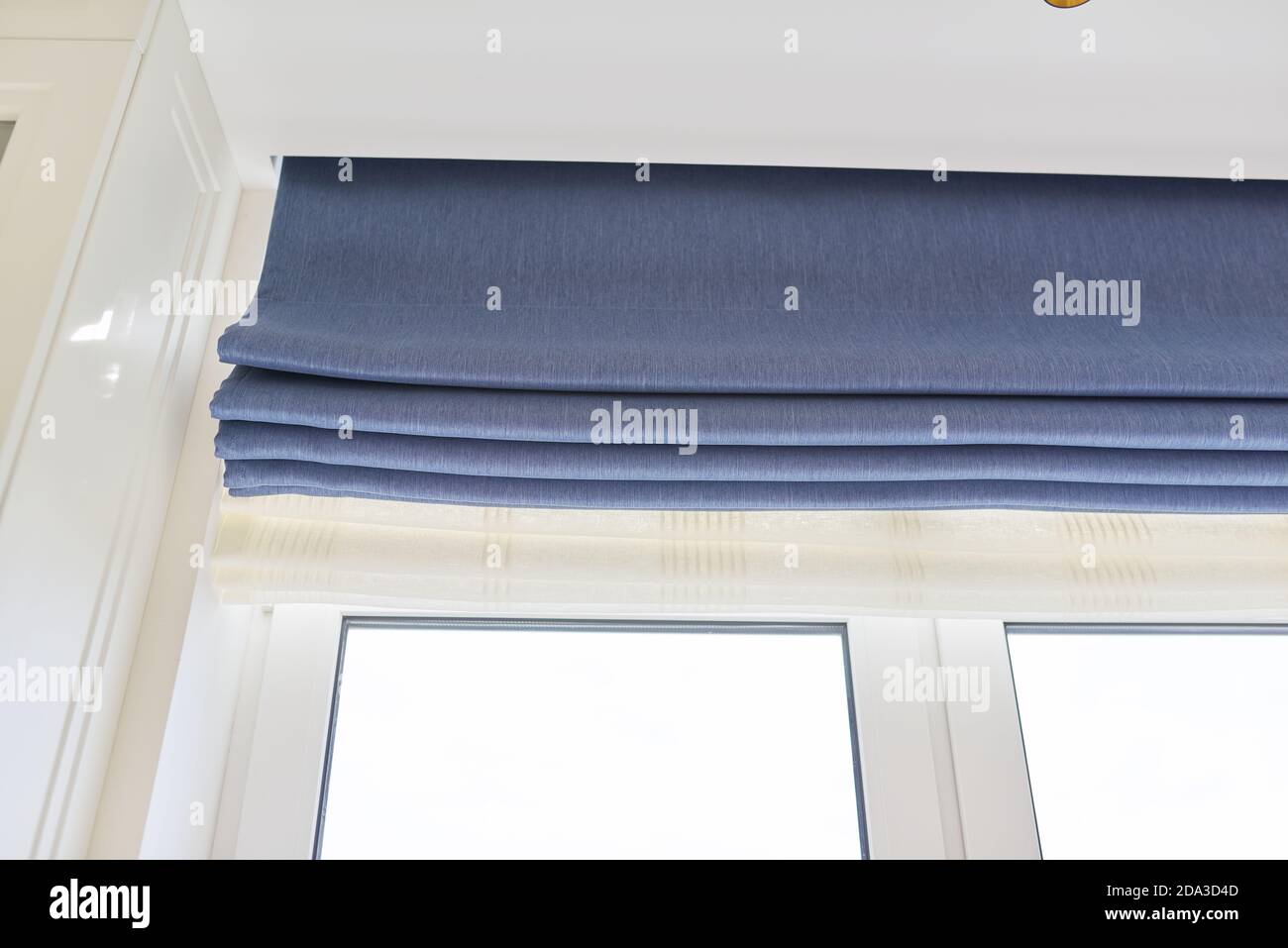 Roman blind in the interior detail close-up Stock Photo - Alamy