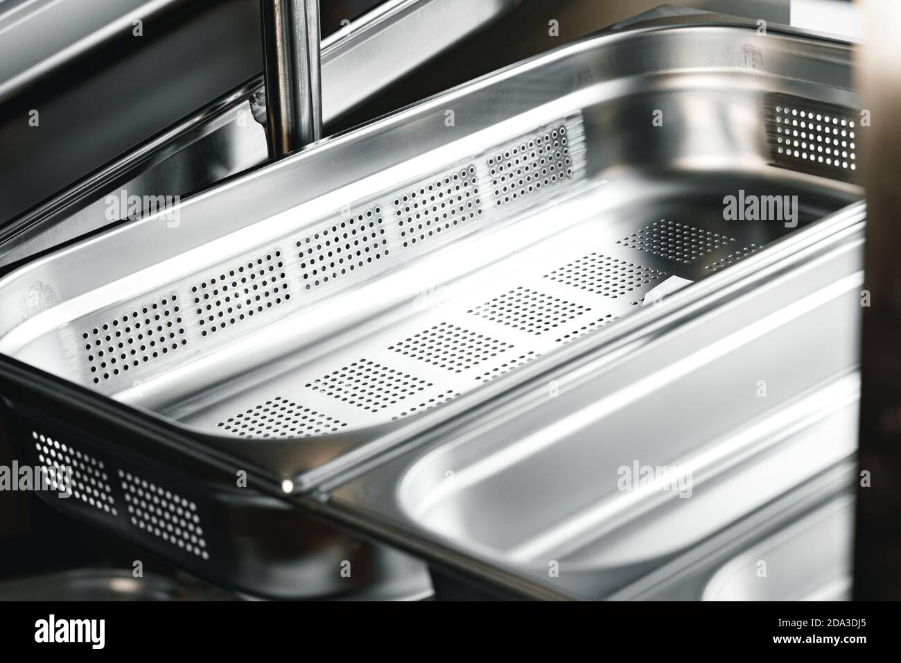 Industrial kitchen metal trays for buffet catering Stock Photo - Alamy