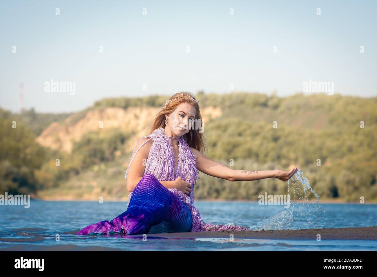 Mermaid on land hi-res stock photography and images - Alamy
