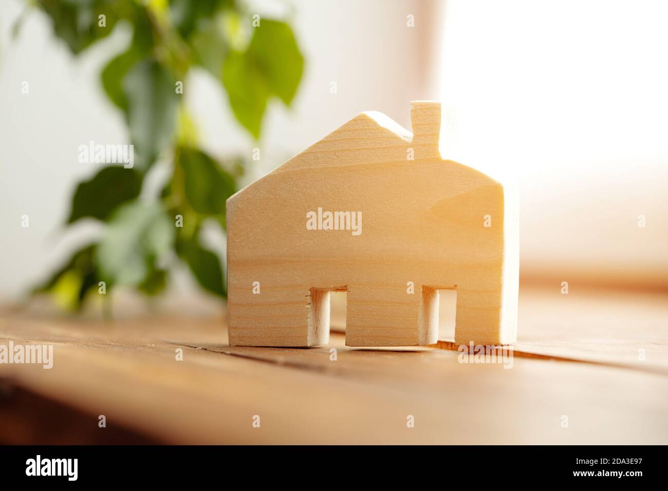 Little toy house model carved from wood Stock Photo - Alamy
