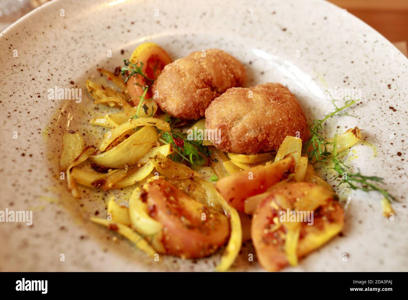 Beef brains breaded with vegetables in georgian restaurant Stock Photo ...