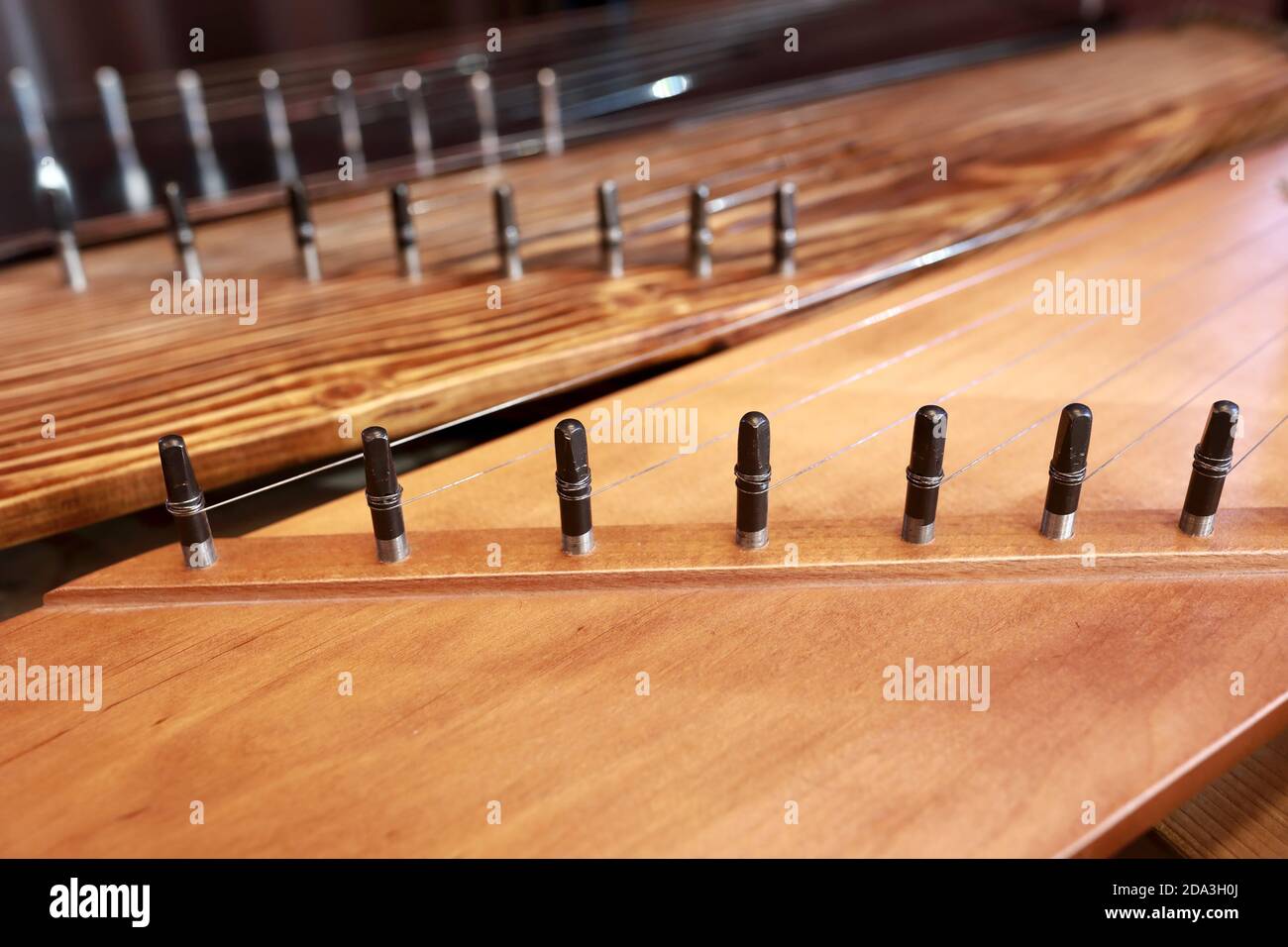 Details of ancient Russian instruments of harp on table Stock Photo - Alamy