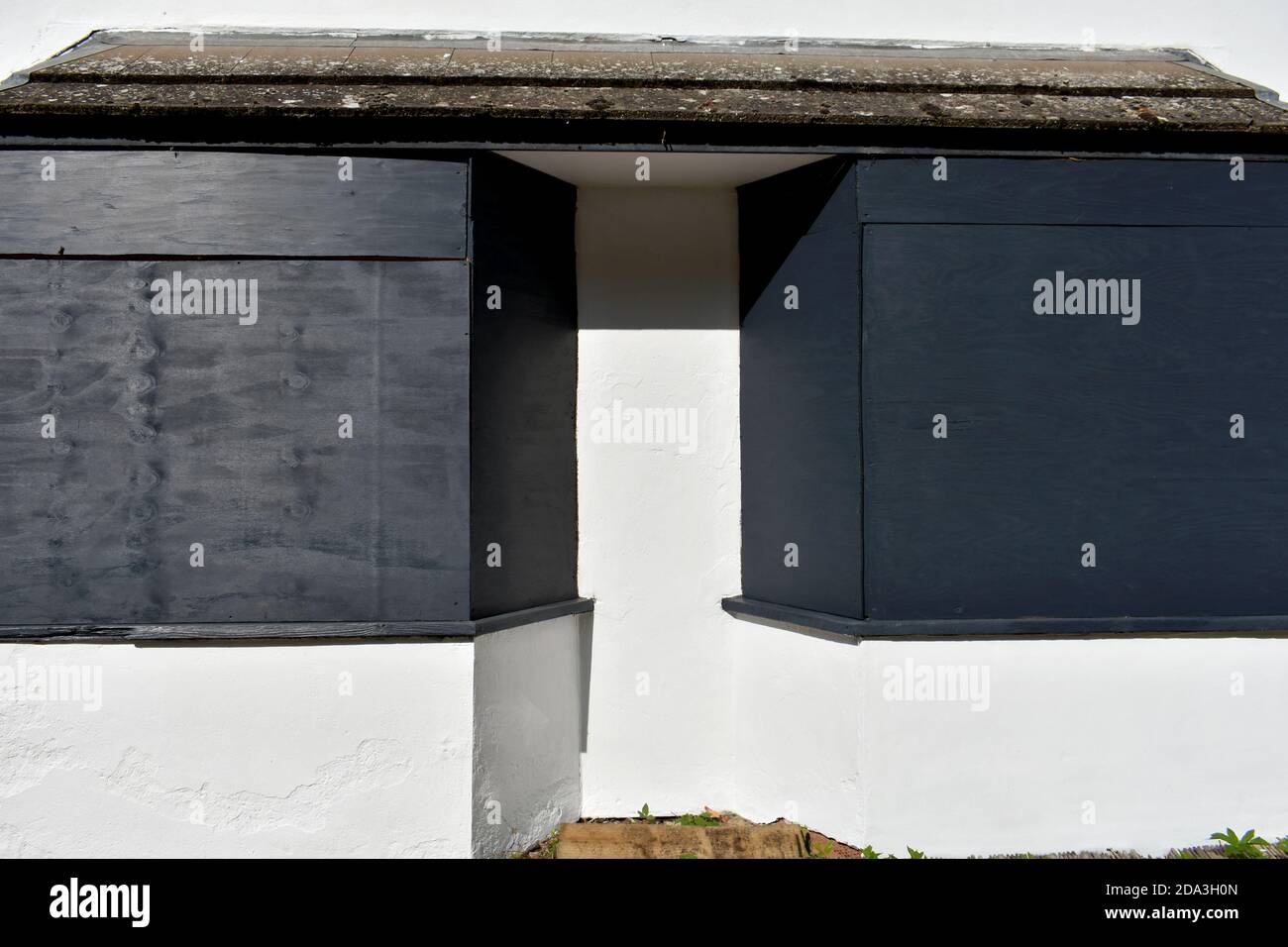 Old shop whitewash white wash window windows house hi-res stock ...