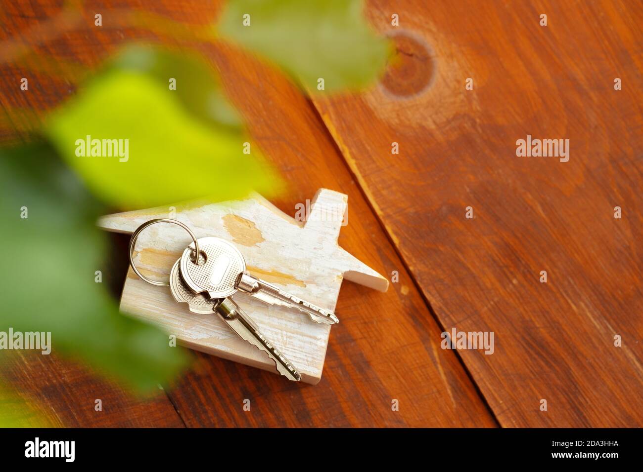 Wooden house model miniature and house keys Stock Photo - Alamy