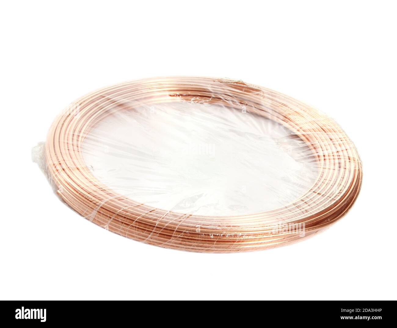 Closeup high angle shot of copper tubes wrapped in plastic on an ...