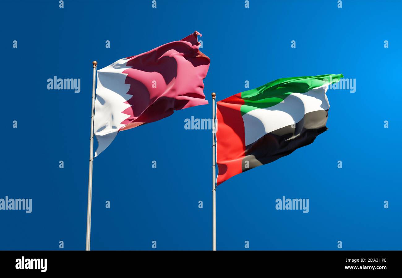 Beautiful national state flags of Qatar and UAE United Arab Emirates ...