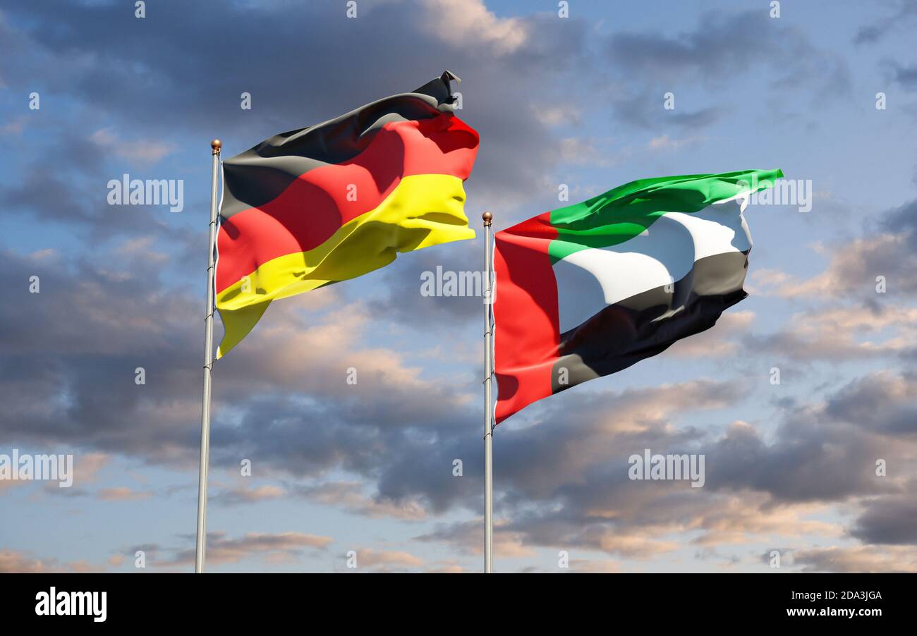 Beautiful national state flags of Germany and UAE United Arab Emirates ...