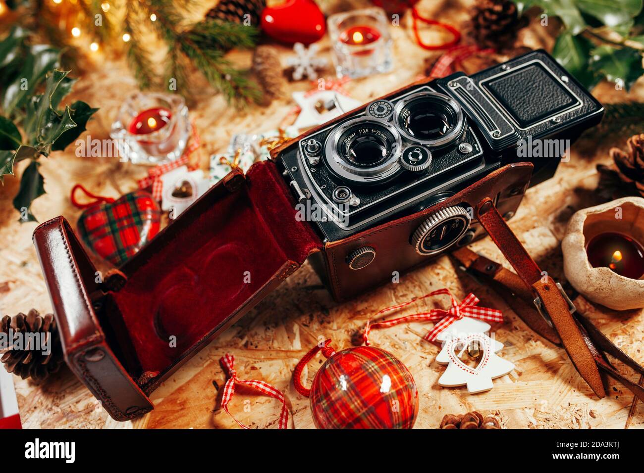Vintage camera with christmas background full of lights still life on a ...