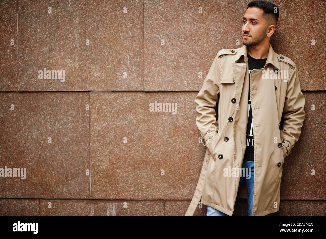 Stylish kuwaiti man at trench coat Stock Photo - Alamy