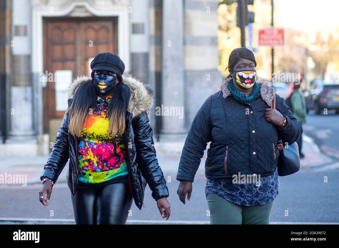 Funny masks in Camberwell, South London, today as lockdown was imposed ...