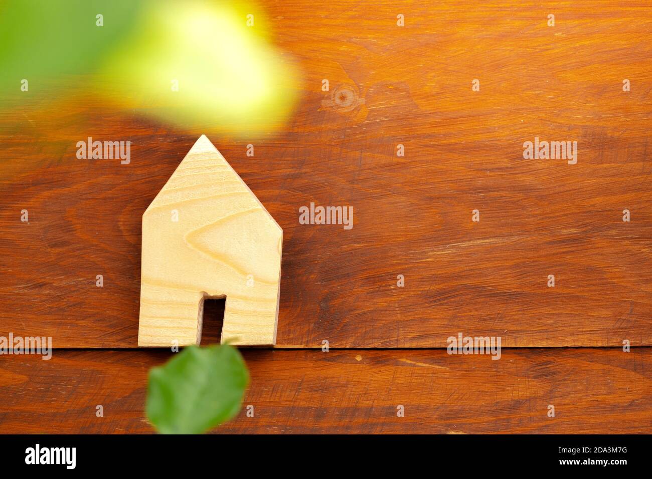 Little toy house model carved from wood Stock Photo - Alamy