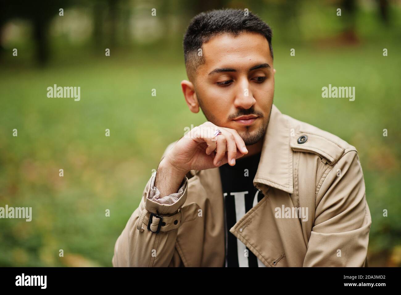 Stylish kuwaiti man at trench coat Stock Photo - Alamy