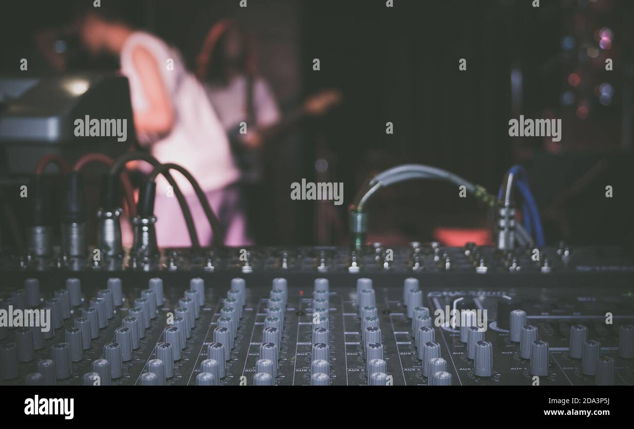 Audio mixer and music equipment. during a live show. Bokeh blur ...