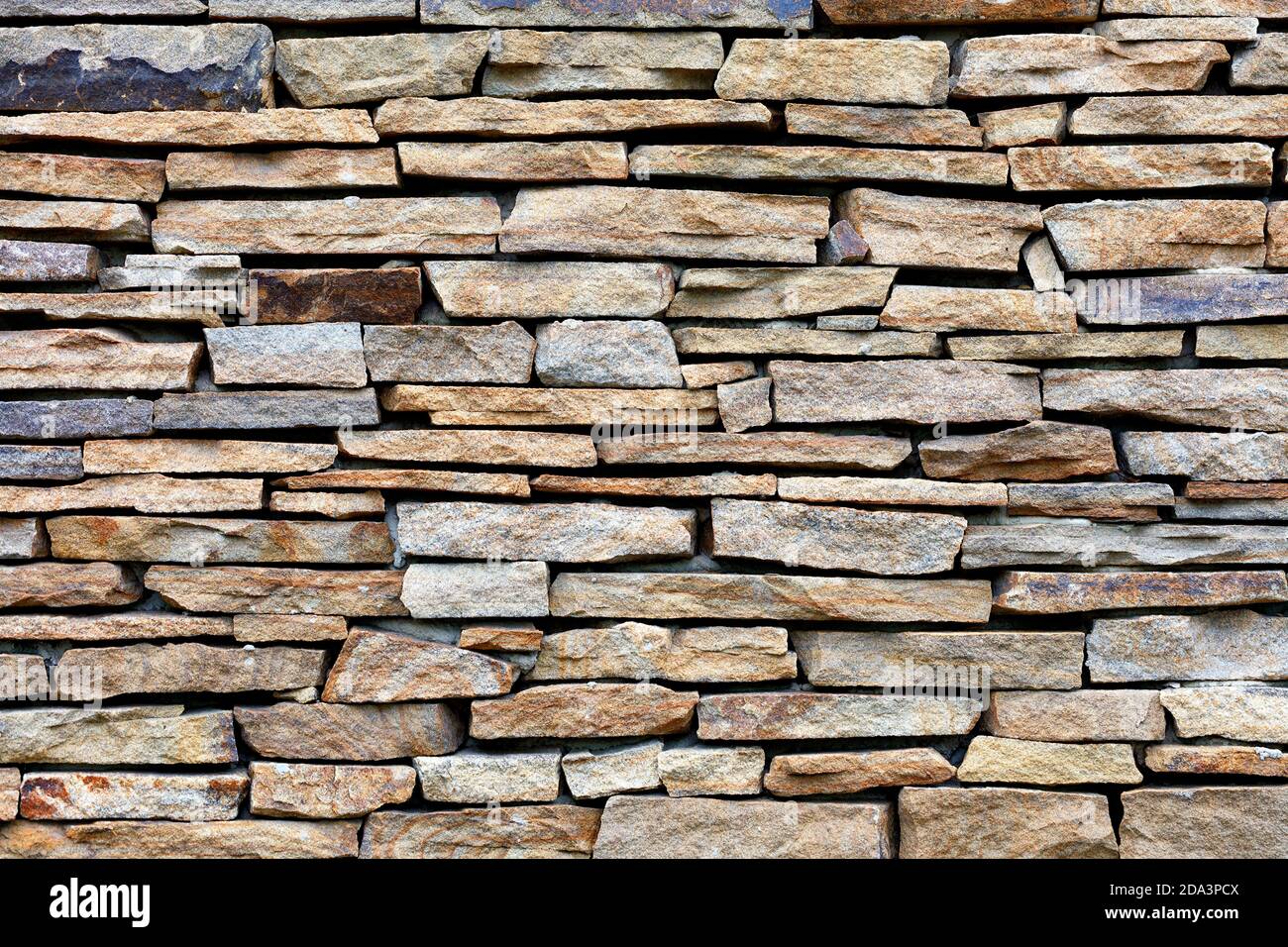 Sandstone stone wall mosaic, expressive texture and background Stock ...