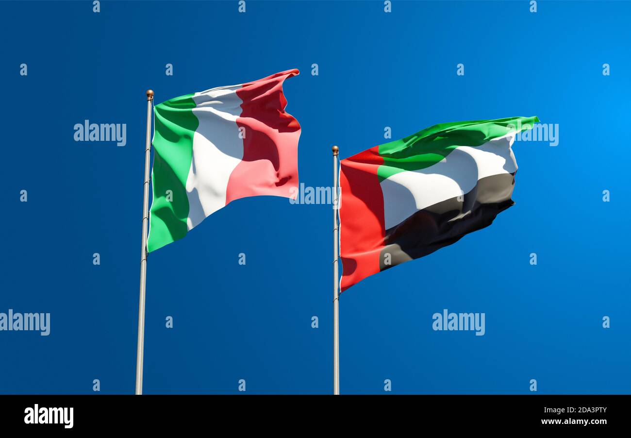 Beautiful national state flags of Italy and UAE United Arab Emirates ...