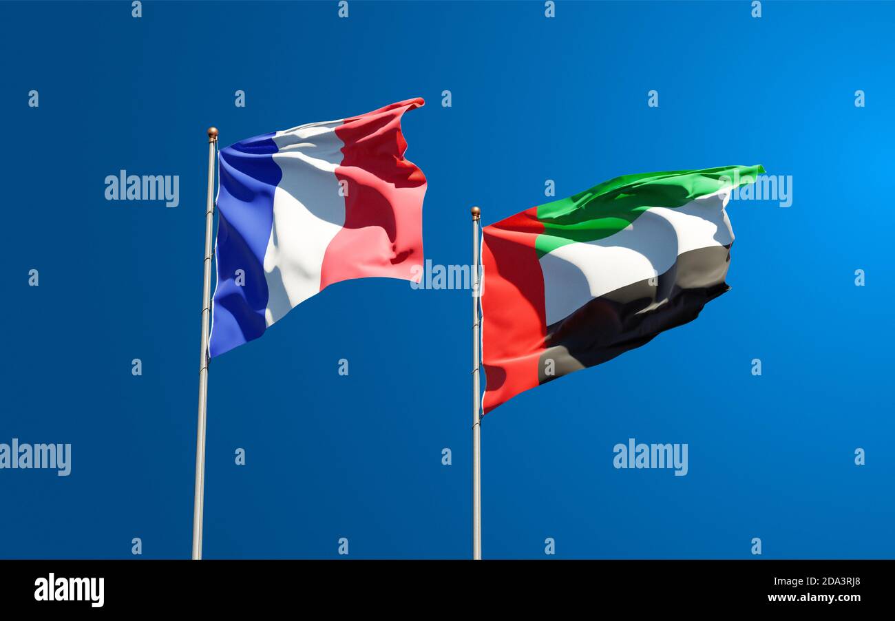 Beautiful national state flags of France and UAE United Arab Emirates ...