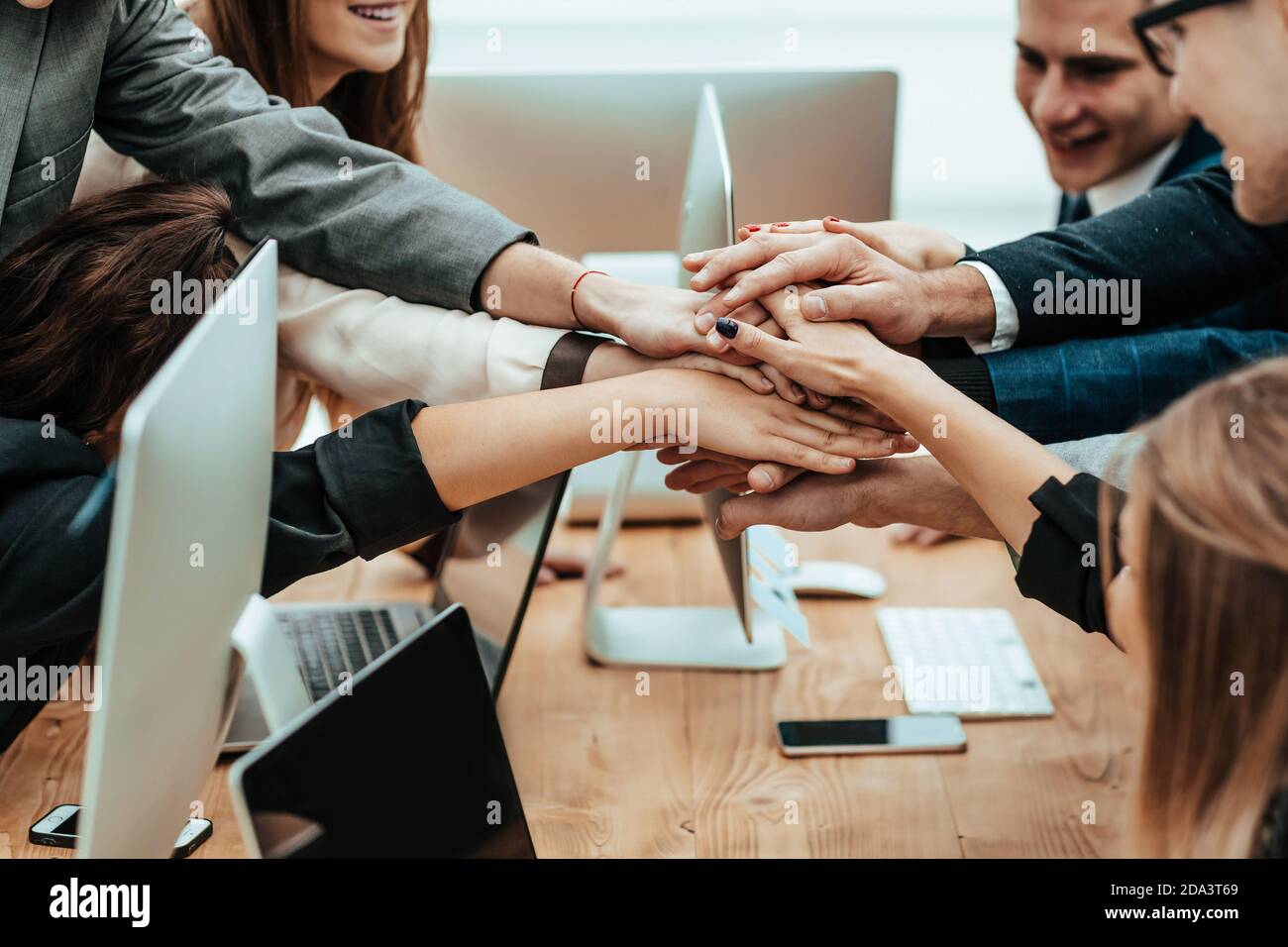 close up. business team showing their unity Stock Photo - Alamy