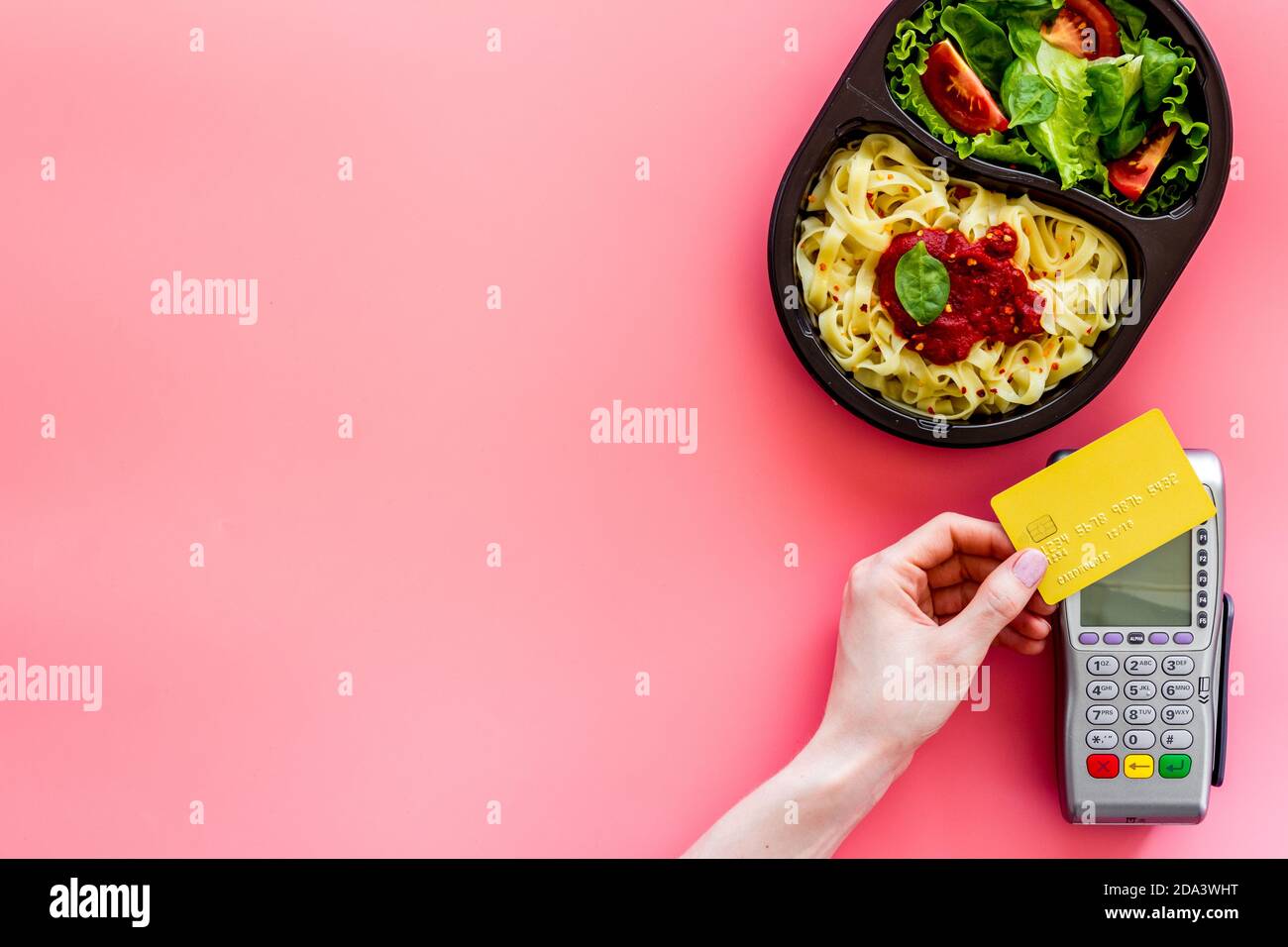Food delivery payment with terminal and lunch boxes with meal Stock ...
