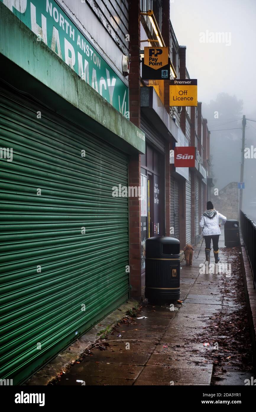 Pharmacy closed with shutters down Stock Photo - Alamy