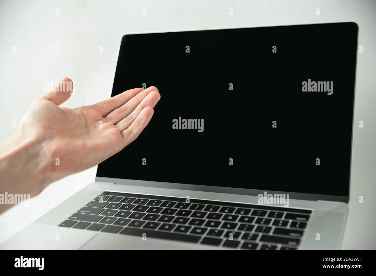 close up. man is pointing at the screen of his laptop Stock Photo - Alamy