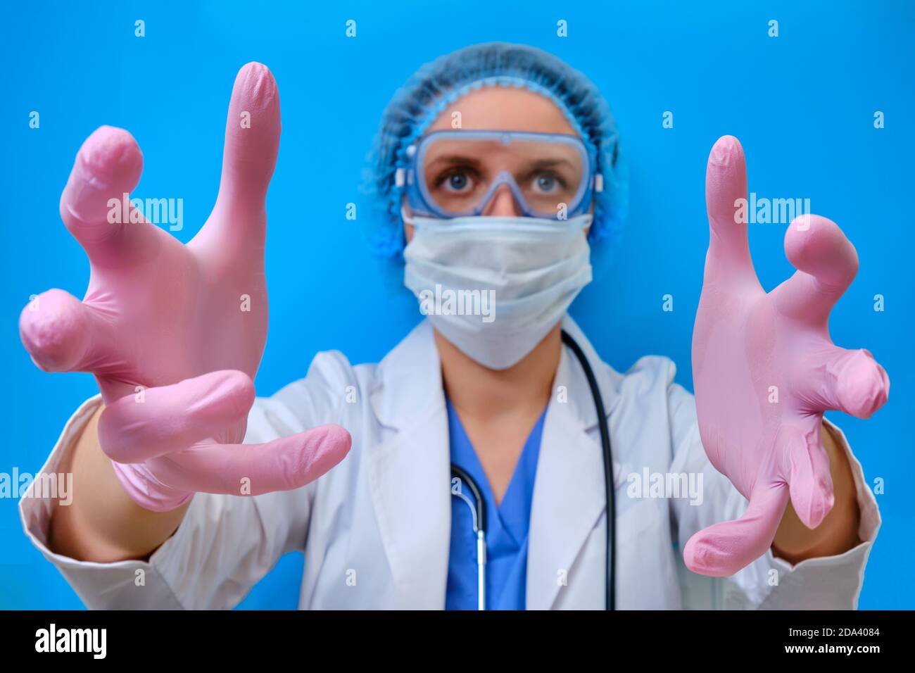 Creepy doctor's hands reaching forward to the patient as if in delirium ...