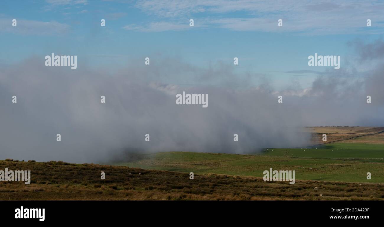 Temperature inversion causes fog in Northumberland valley Stock Photo ...