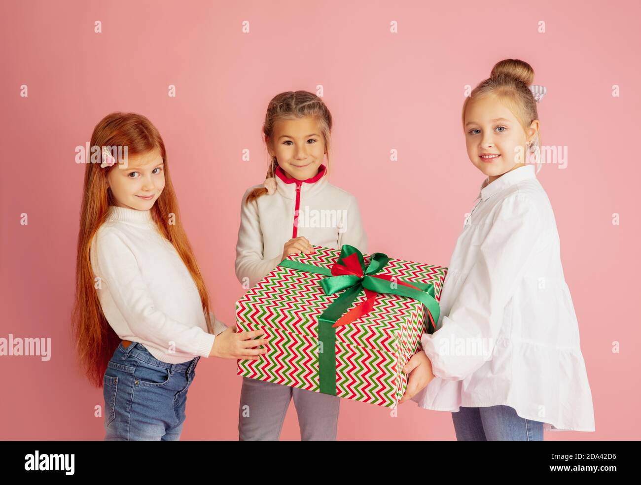 Giving and getting presents on Christmas holidays. Group of happy ...