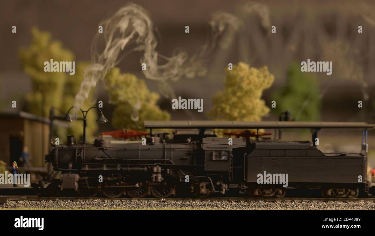 Lokomotive model with smoke Stock Photo - Alamy
