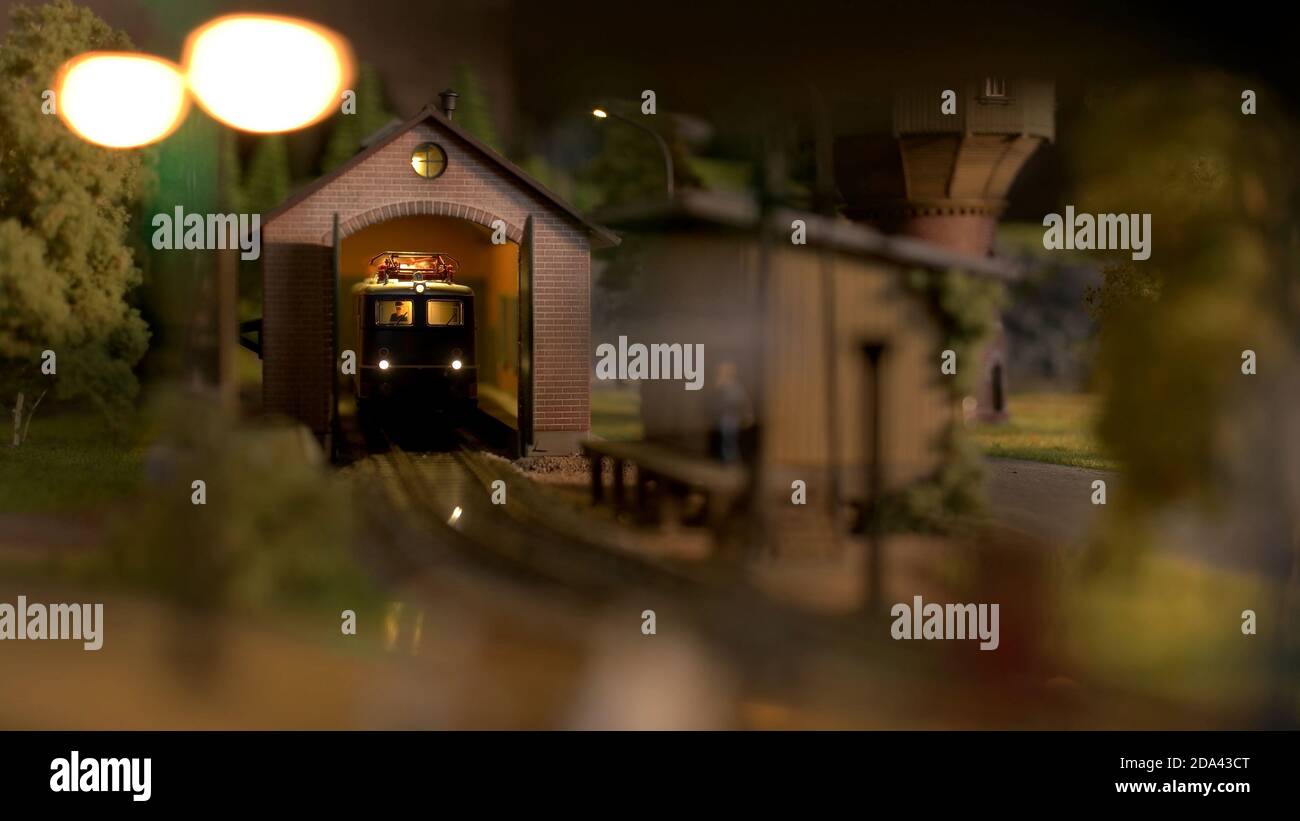 Front view train in a railway shed Stock Photo - Alamy
