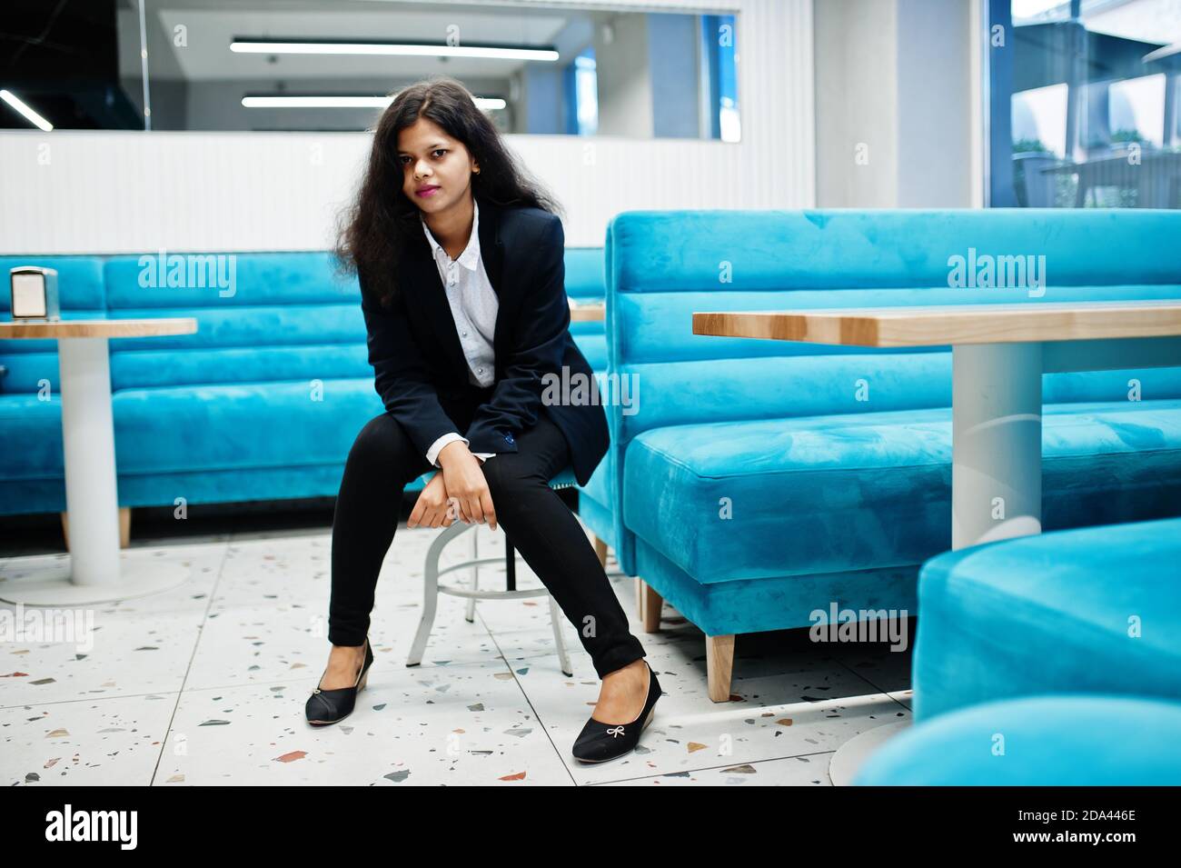 Gorgeous indian woman wear formal posing at cafe Stock Photo - Alamy