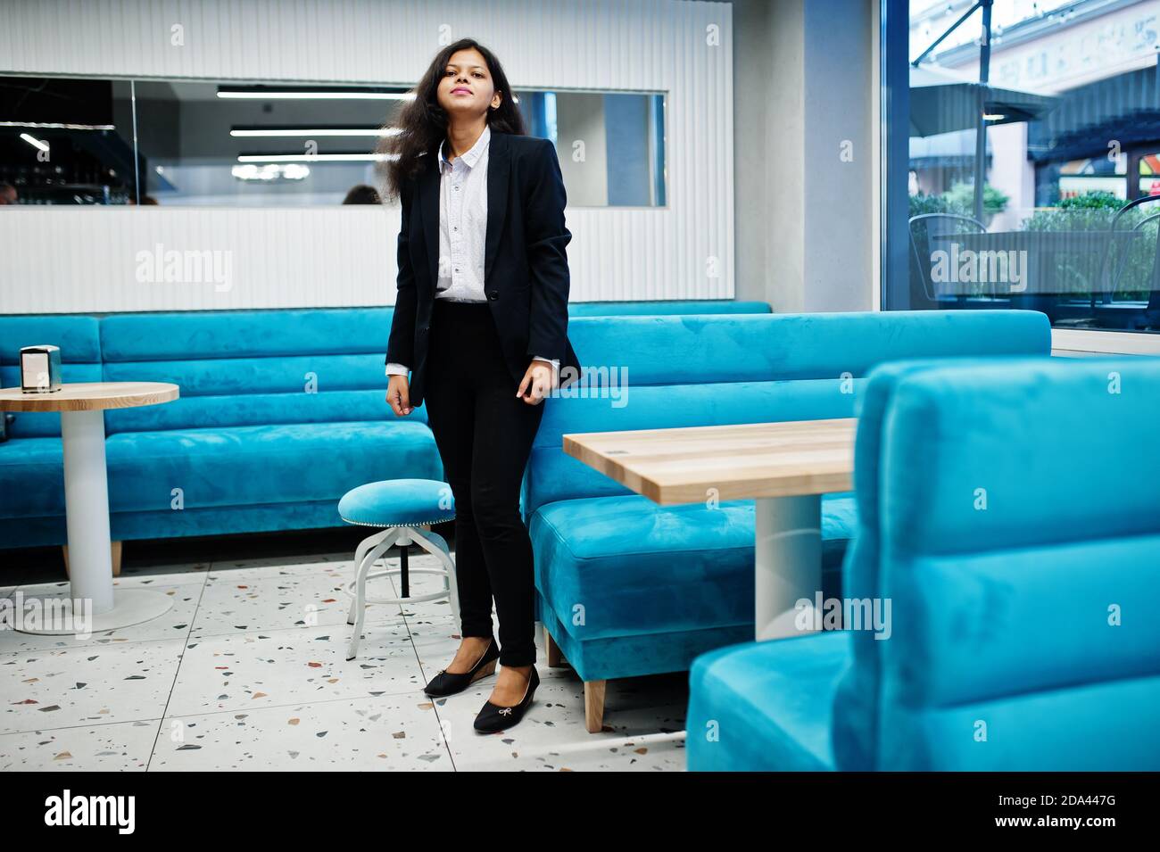 Gorgeous indian woman wear formal posing at cafe Stock Photo - Alamy