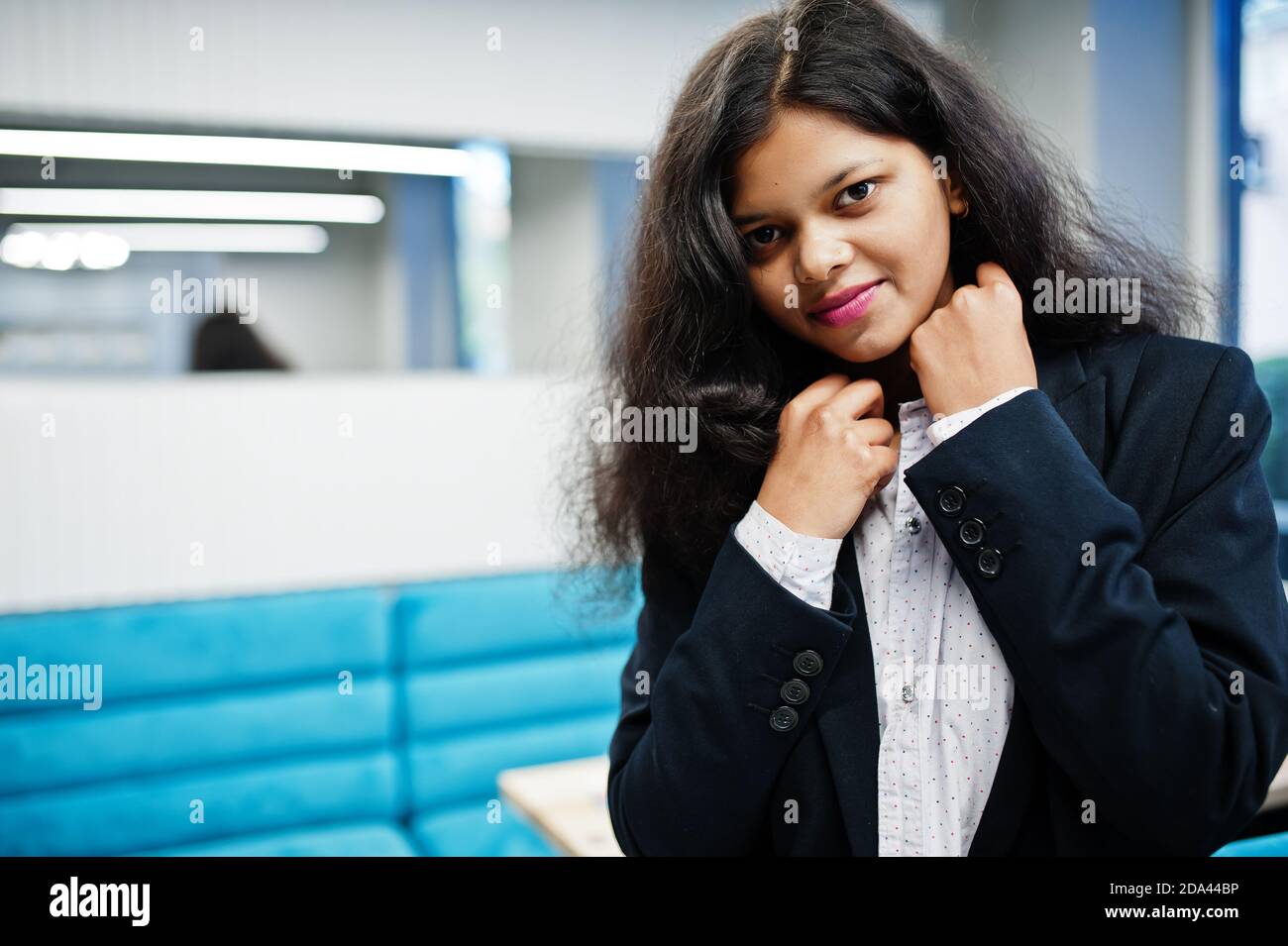 Gorgeous indian woman wear formal posing at cafe Stock Photo - Alamy