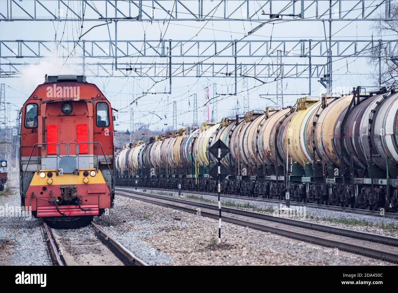 Freight locomotives moves on the station at autumn evening Stock Photo ...