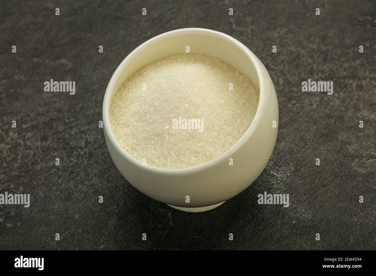 White sweet sugar in the bowl Stock Photo - Alamy