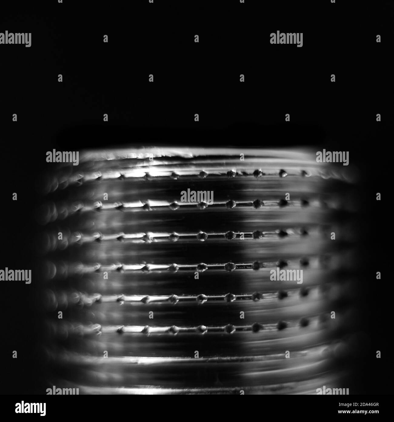 one screw thread for faucet, one head, macro photography in black and ...