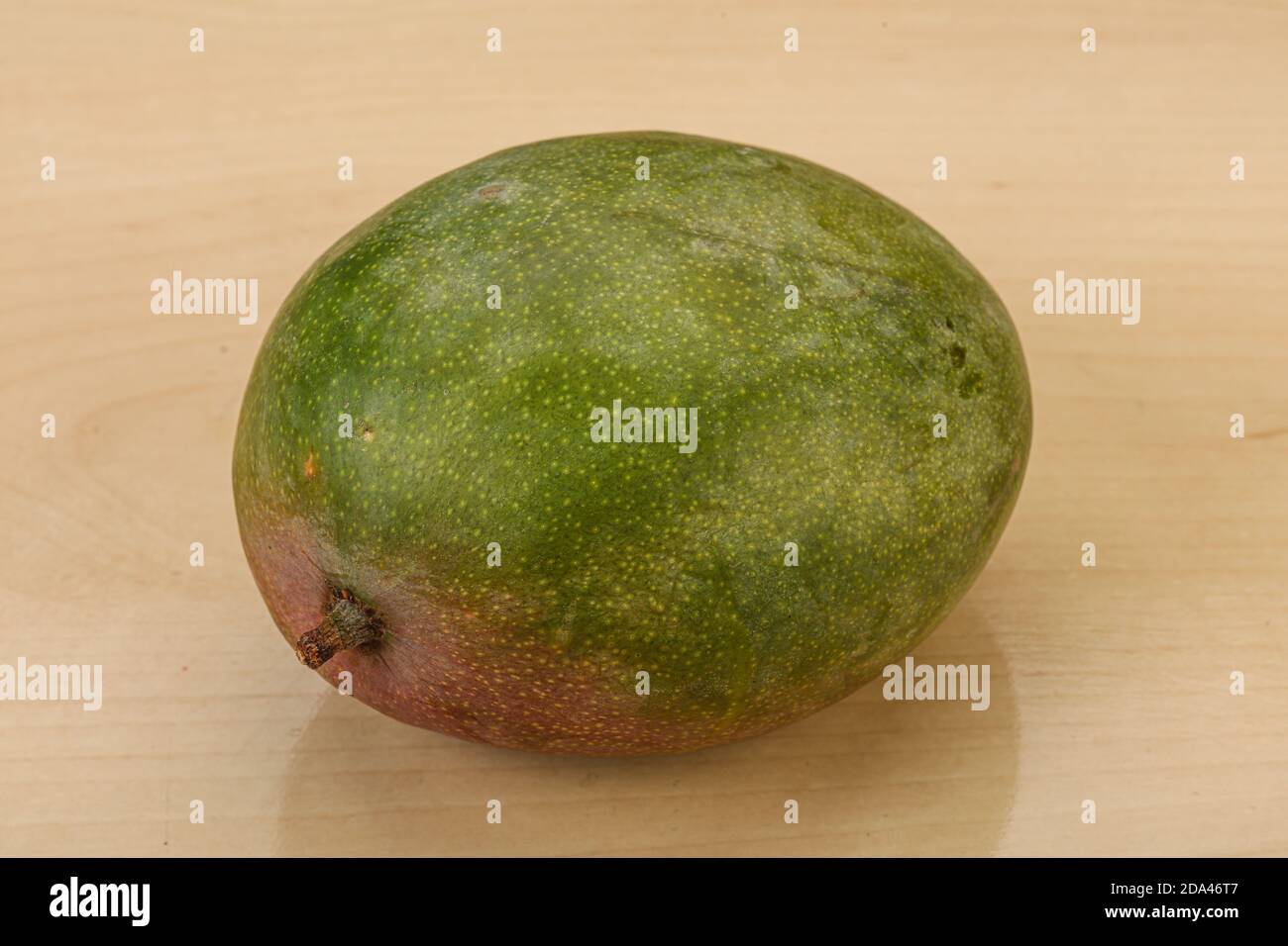 Tropical fruit - Green sweet tasty mango Stock Photo - Alamy