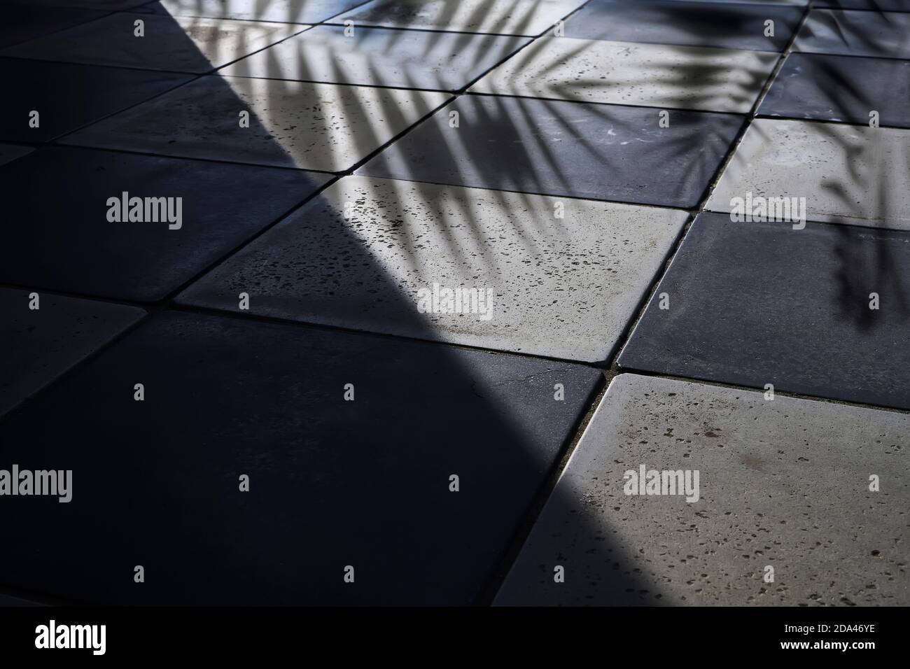 Perspective of a checked regular floor with shadows Stock Photo - Alamy