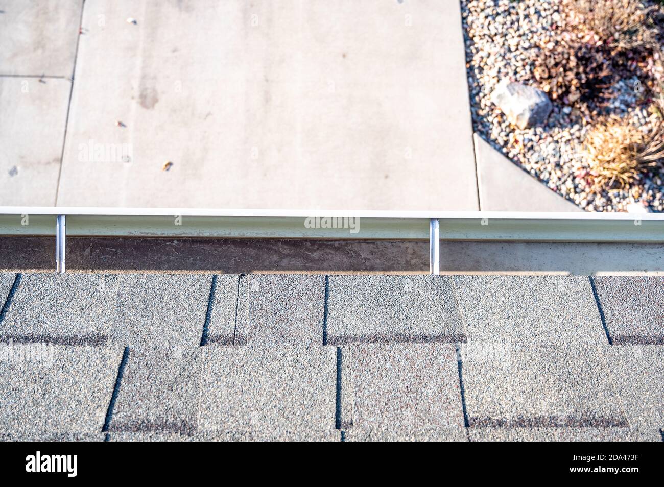 Typical residential gutter and roofing system Stock Photo - Alamy